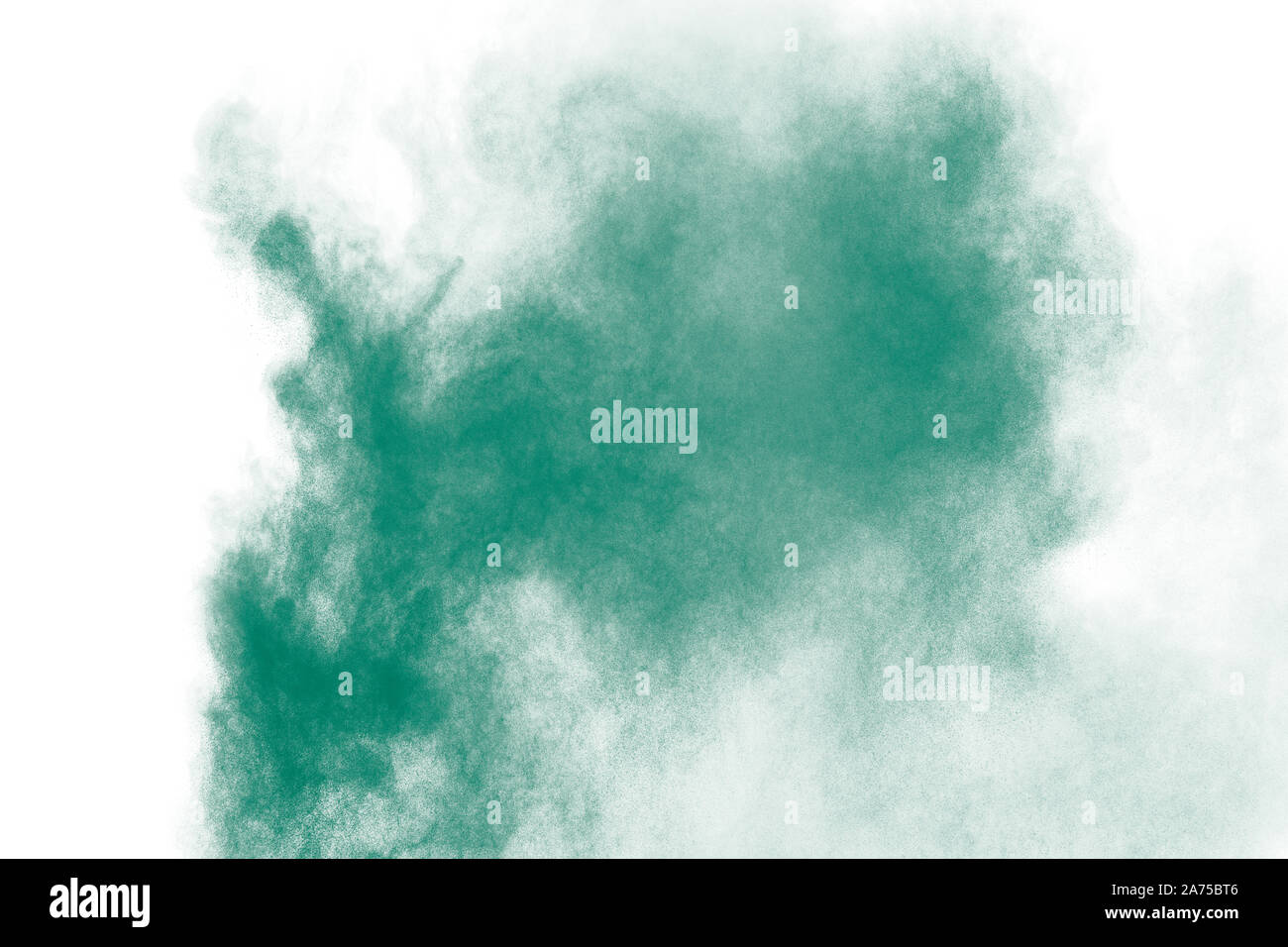 Abstract splash of green colored powder on white background.Green ...