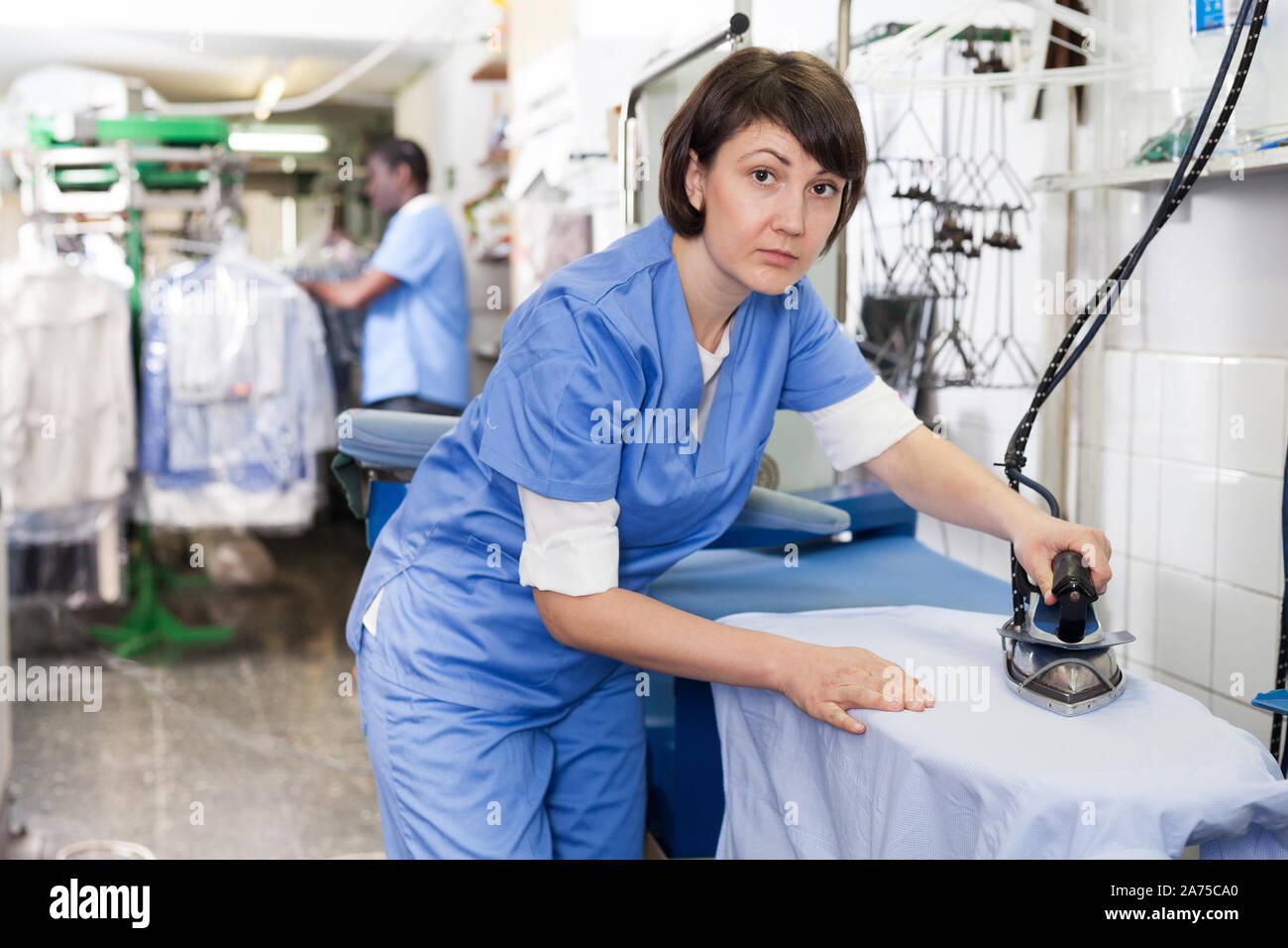 Laundry worker hi-res stock photography and images - Alamy