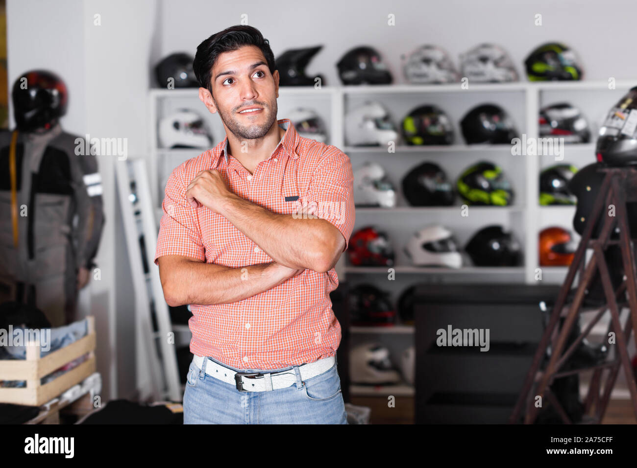 Portrait of glad positive smiling male customer who is posing in the ...