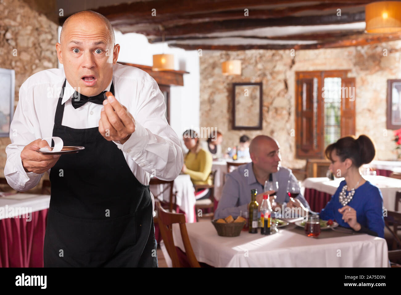 Waiter serving angry man hi-res stock photography and images - Alamy