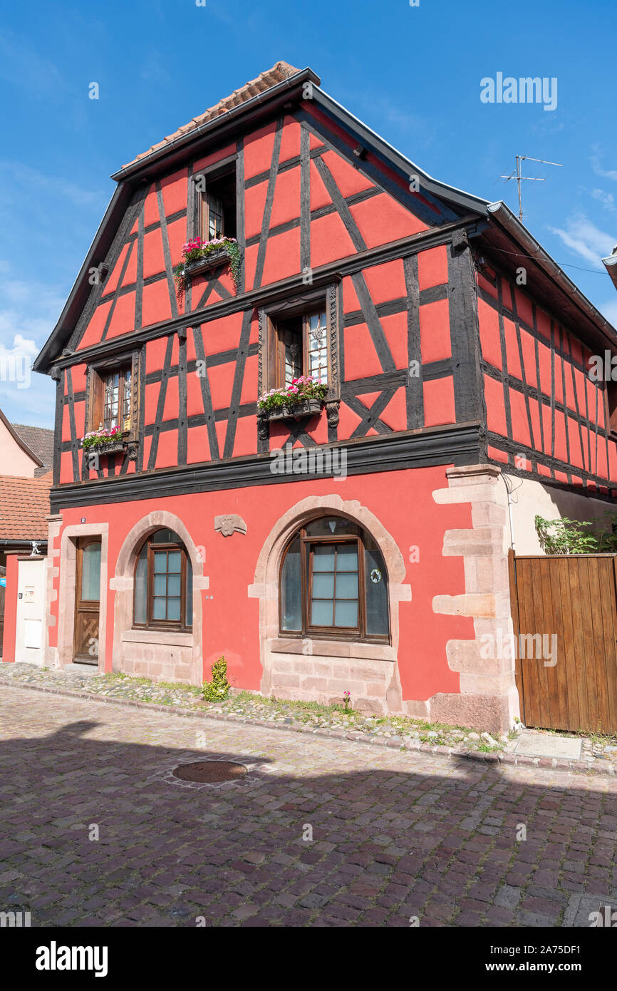 A traditional half timbered house in Alsace France with window boxes ...