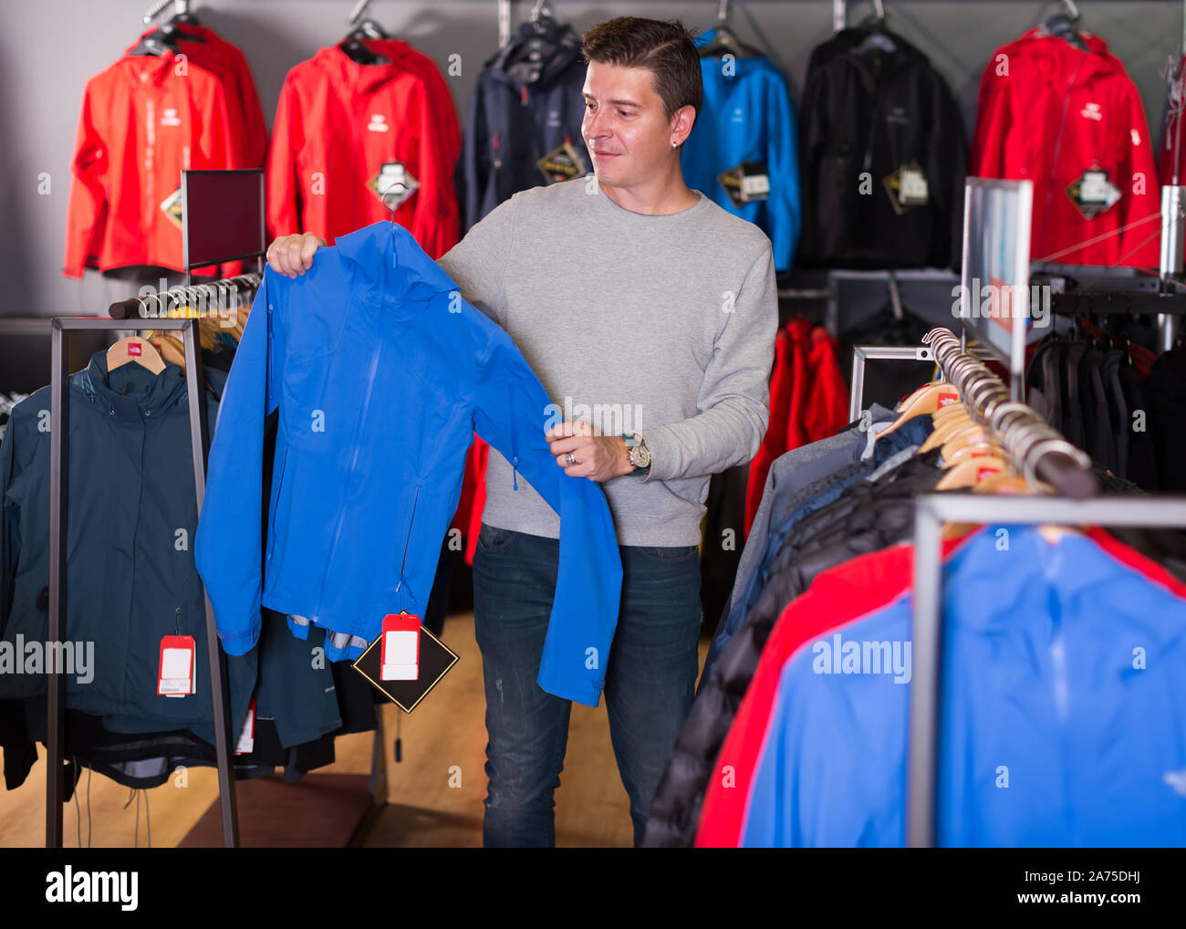 Man chooses clothes hi-res stock photography and images - Alamy