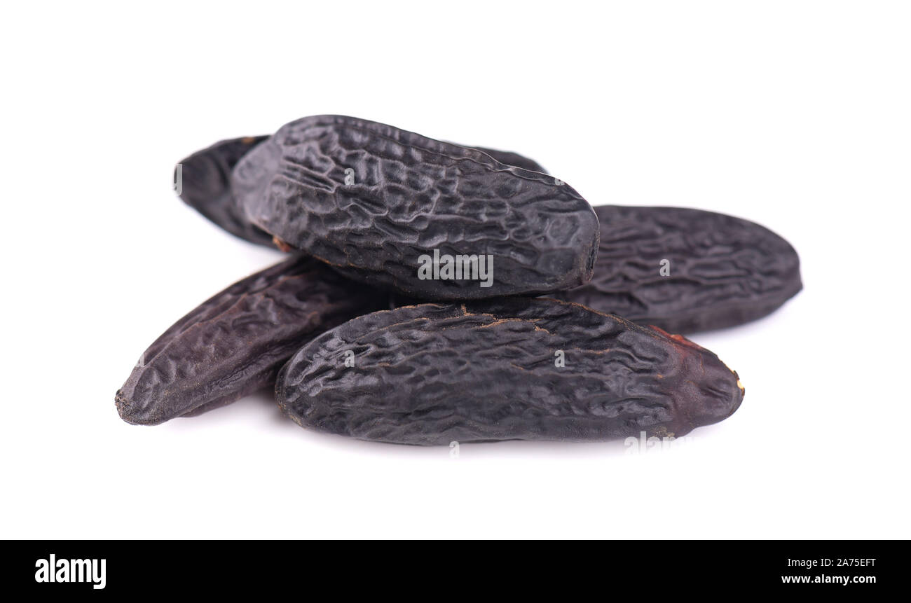 Tonka beans isolated on white background. Bean of Dipteryx odorata ...