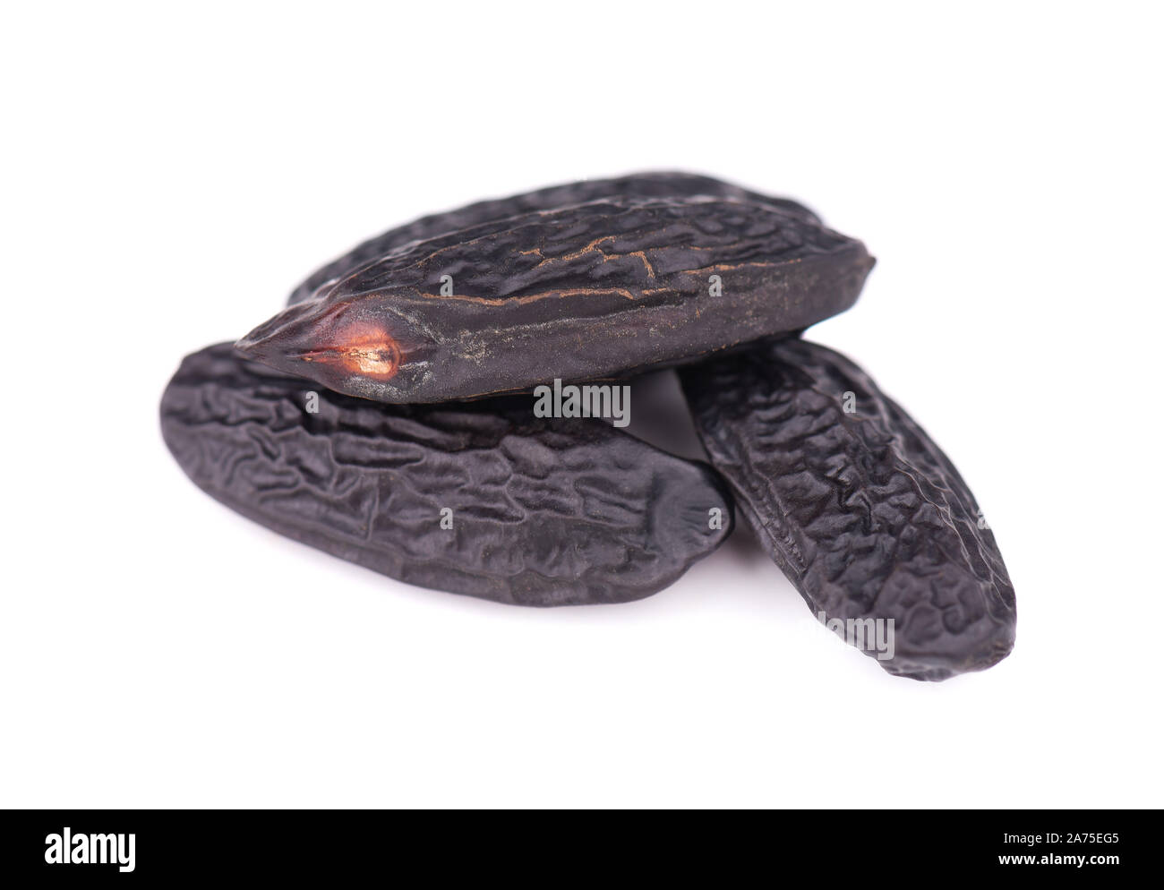 Tonka beans isolated on white background. Bean of Dipteryx odorata ...