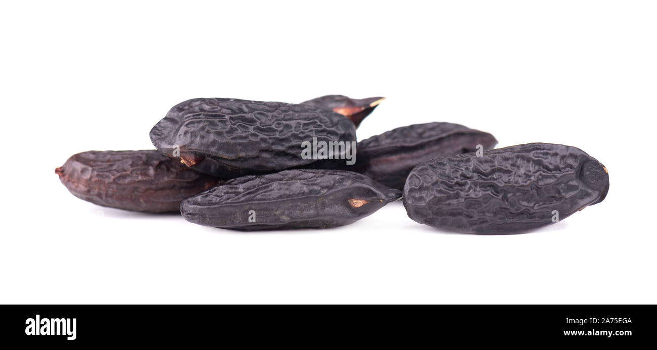 Tonka beans isolated on white background. Bean of Dipteryx odorata ...