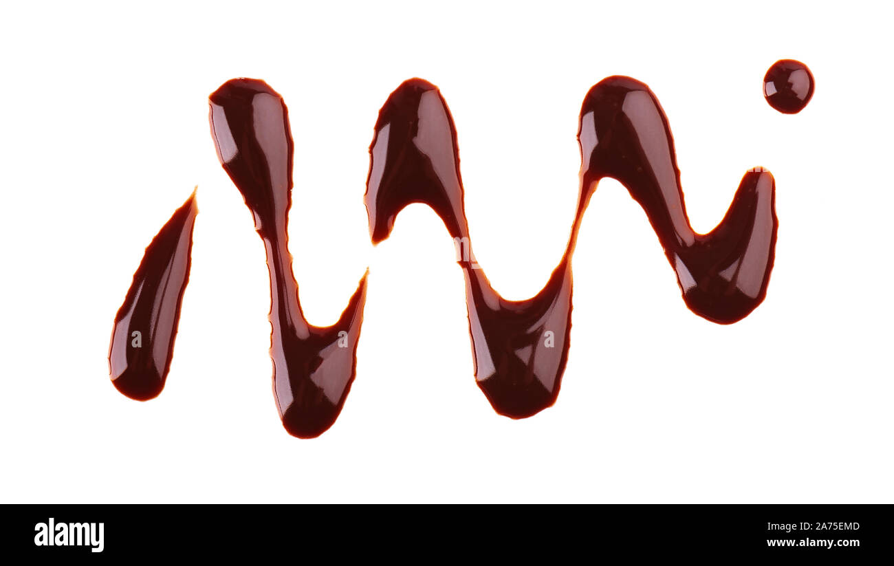 Chocolate syrup drizzle isolated on white background. Splashes of sweet ...