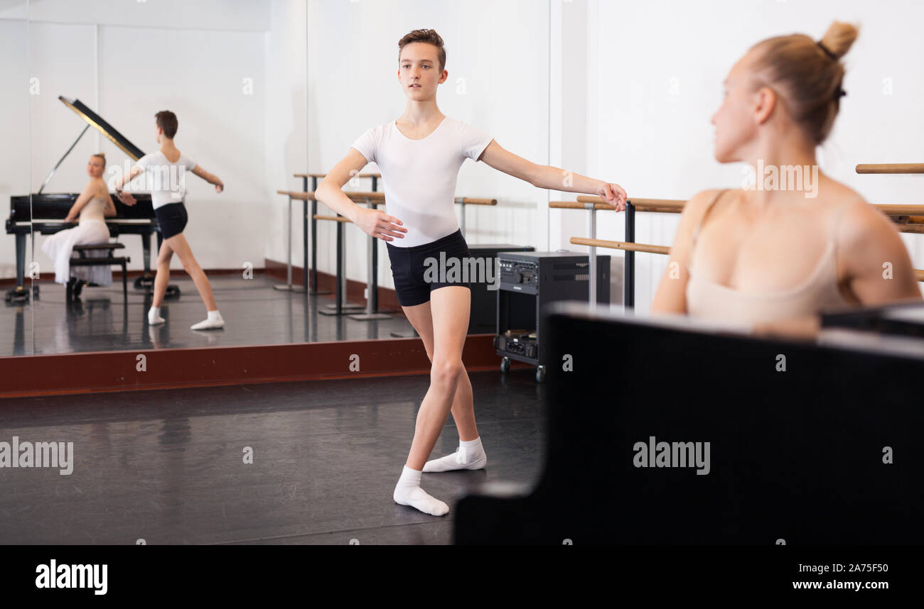 Female choreographer teaches young dancer in ballet studio Stock Photo ...