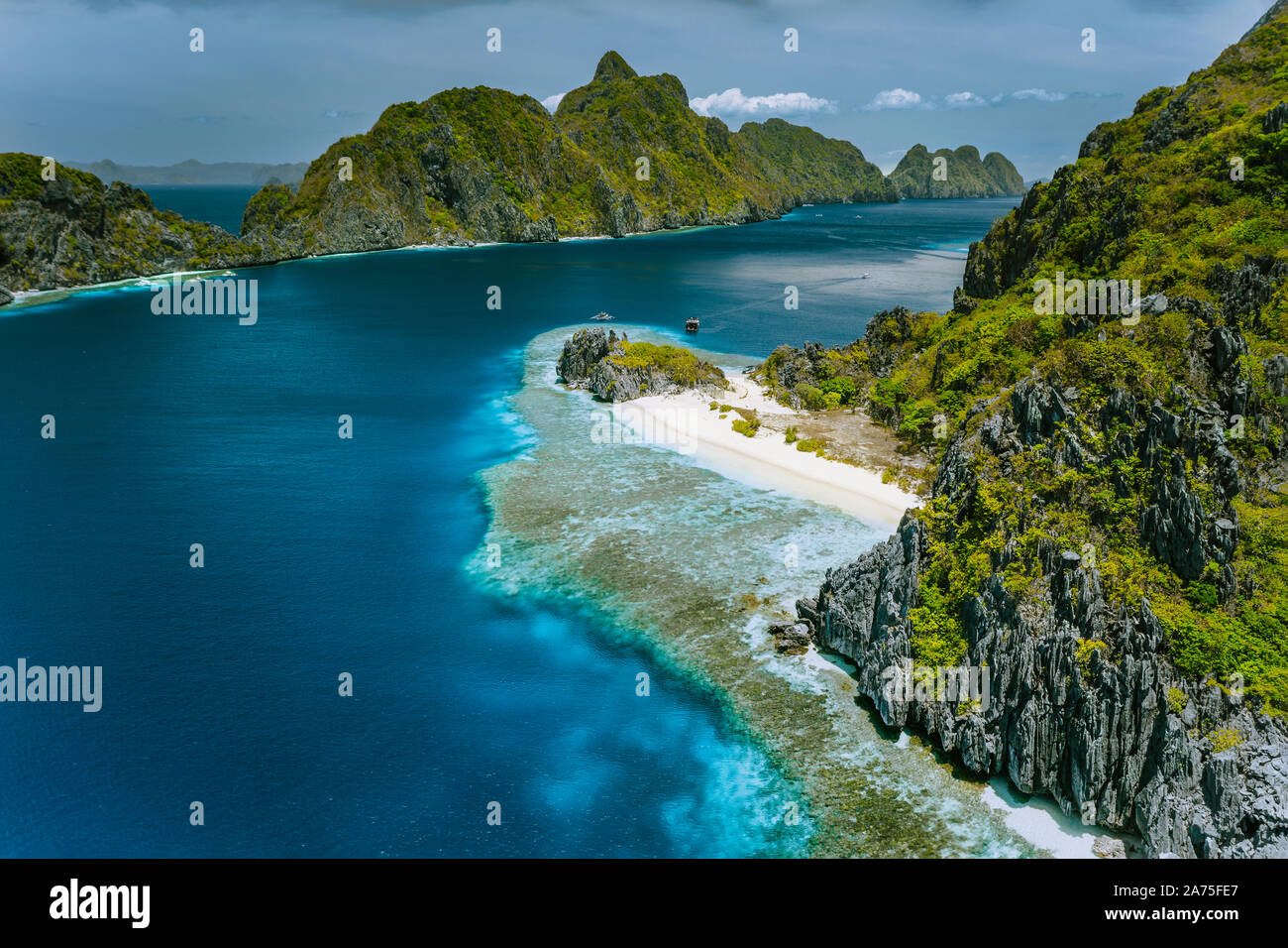Limestone karst cliffs of Matinloc and Tapuitan Islands and straits ...
