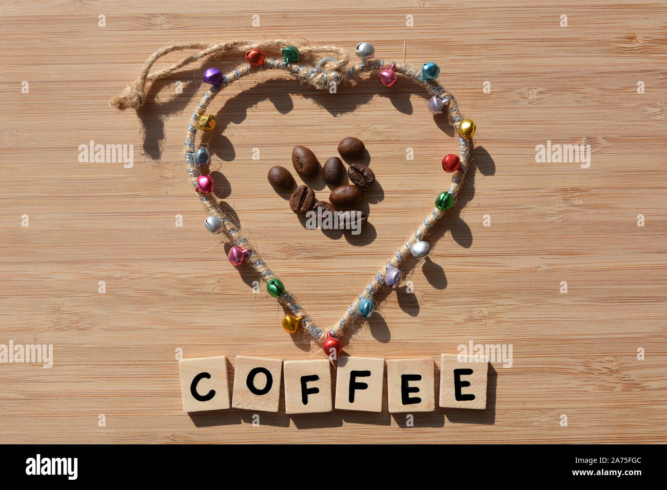 Coffee, Word in 3d wooden alphabet letters with coffee beans in a heart ...