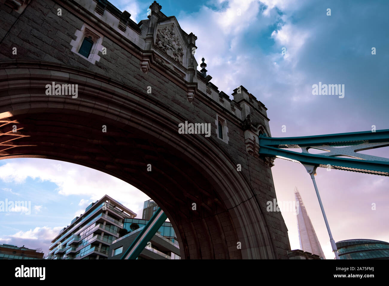 Arch of the majestic Tower Bridge in London, with the Shard tower ...