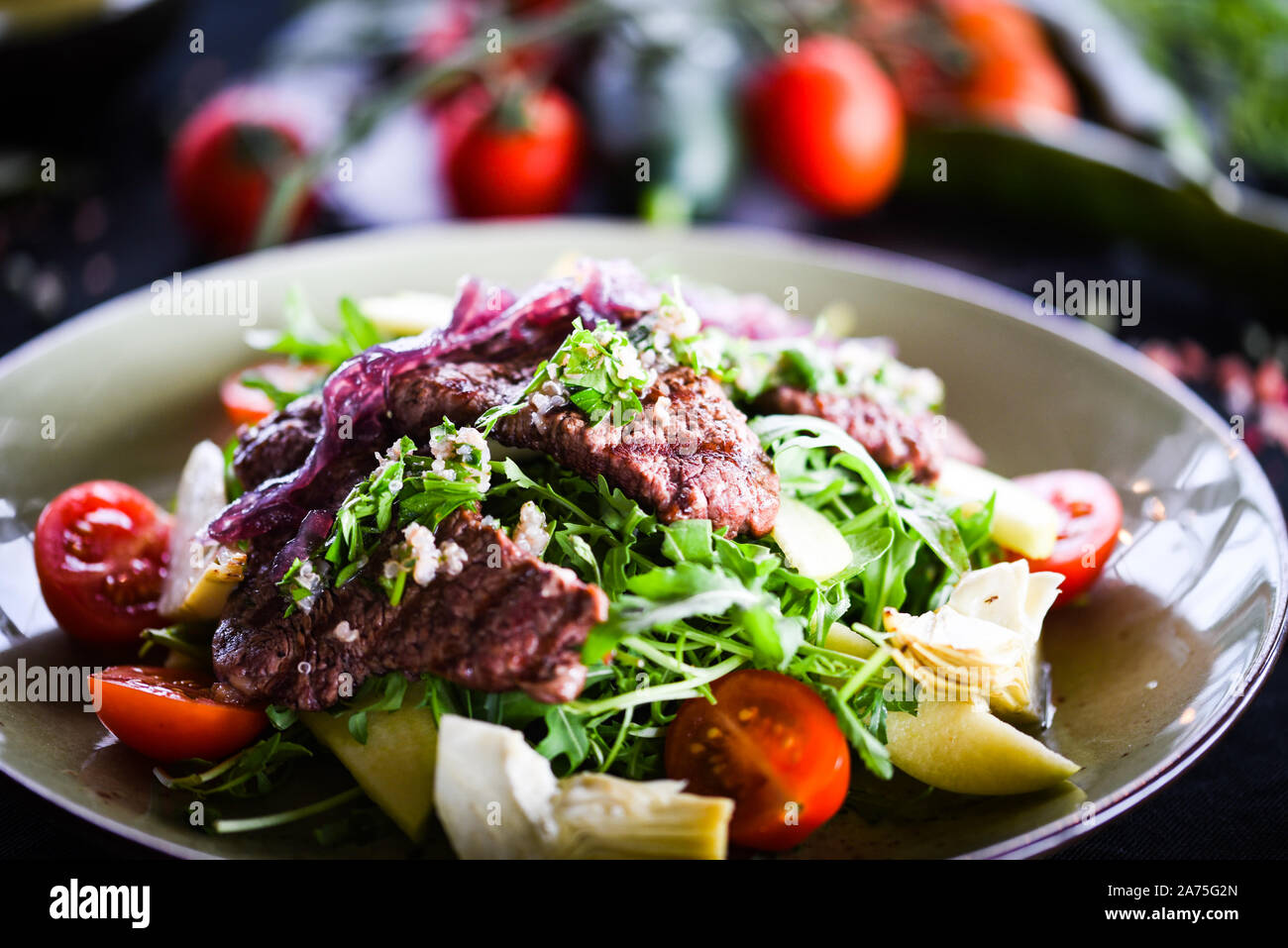 delicious fresh salad with grilled beef meat & tasty vegetables Stock ...