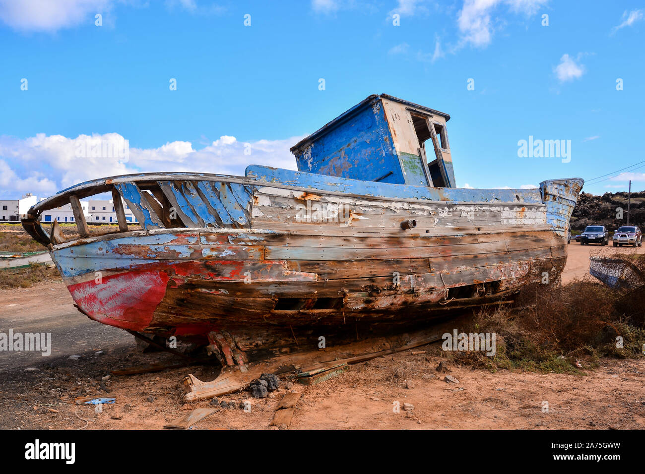 Abandoned old vintage Wooden fishing boat on beach Stock Photo - Alamy