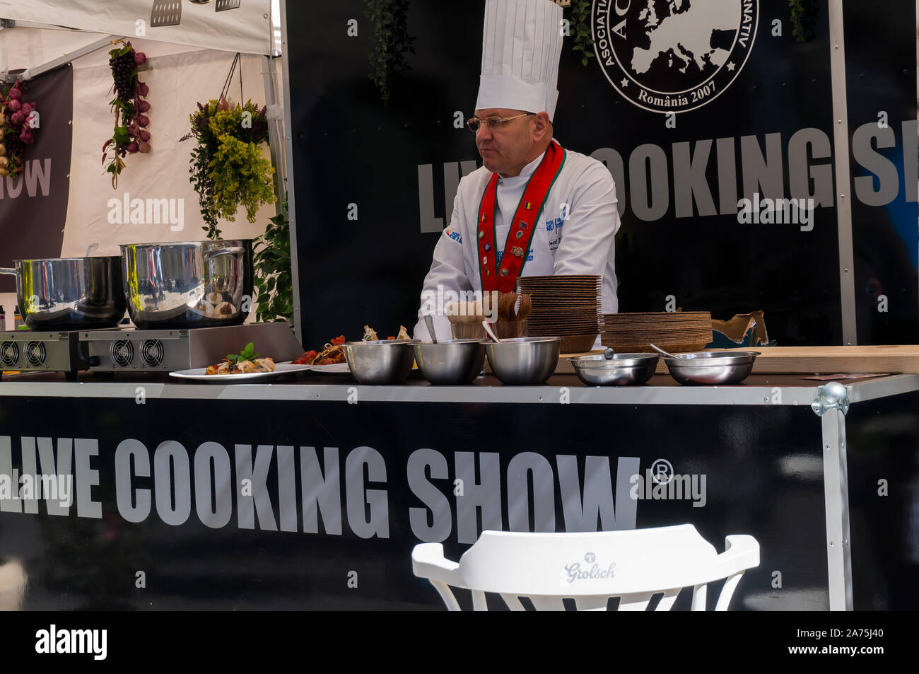 Live cooking street festival Stock Photo - Alamy