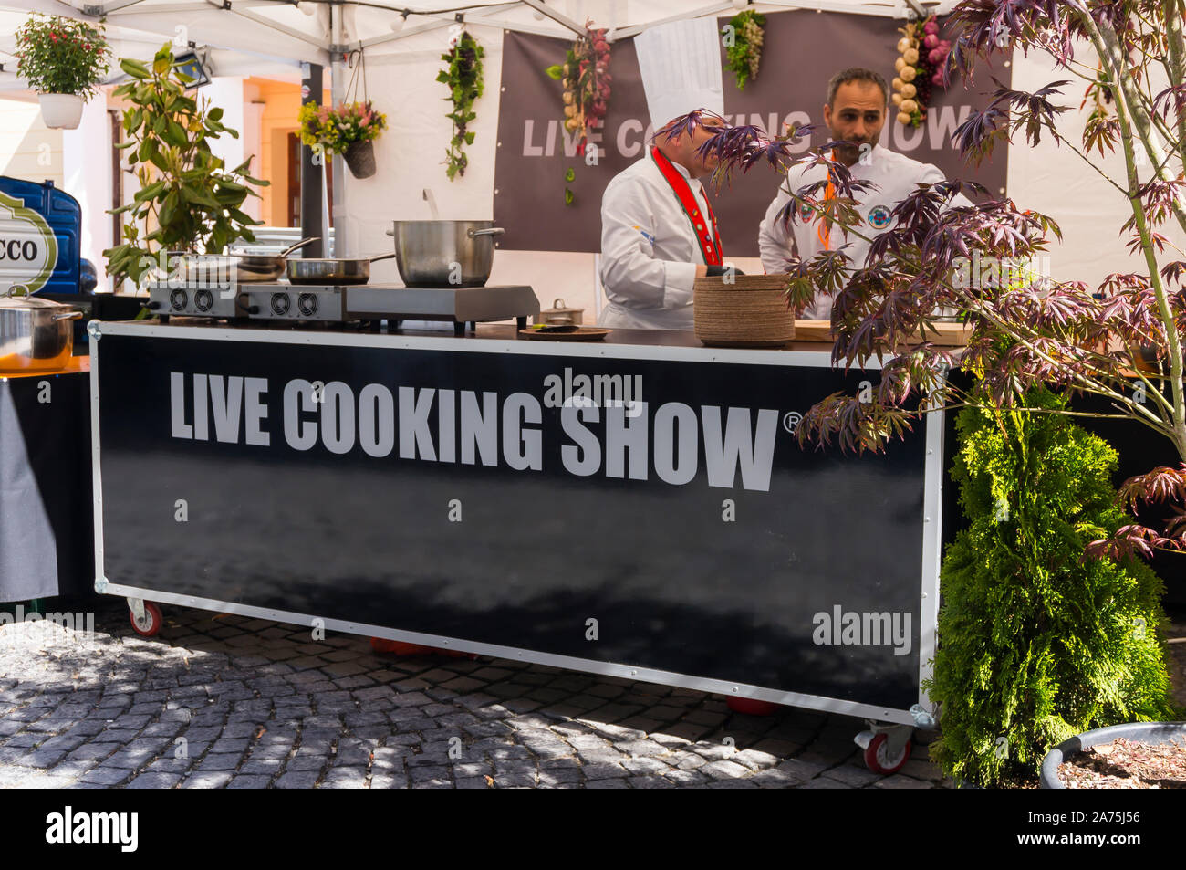 Live cooking street festival Stock Photo - Alamy