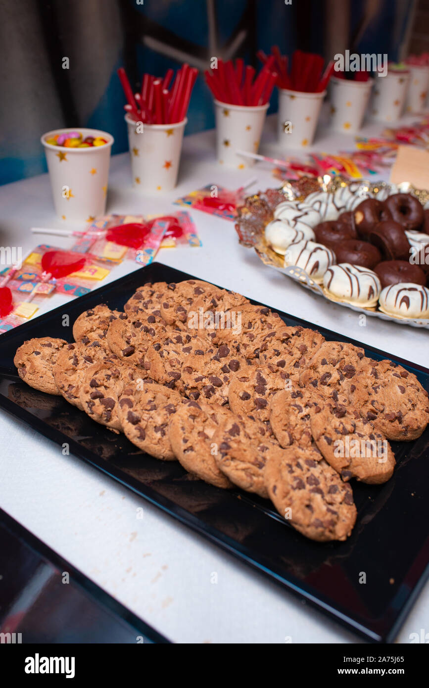 Table of sweets on a birthday party Stock Photo - Alamy