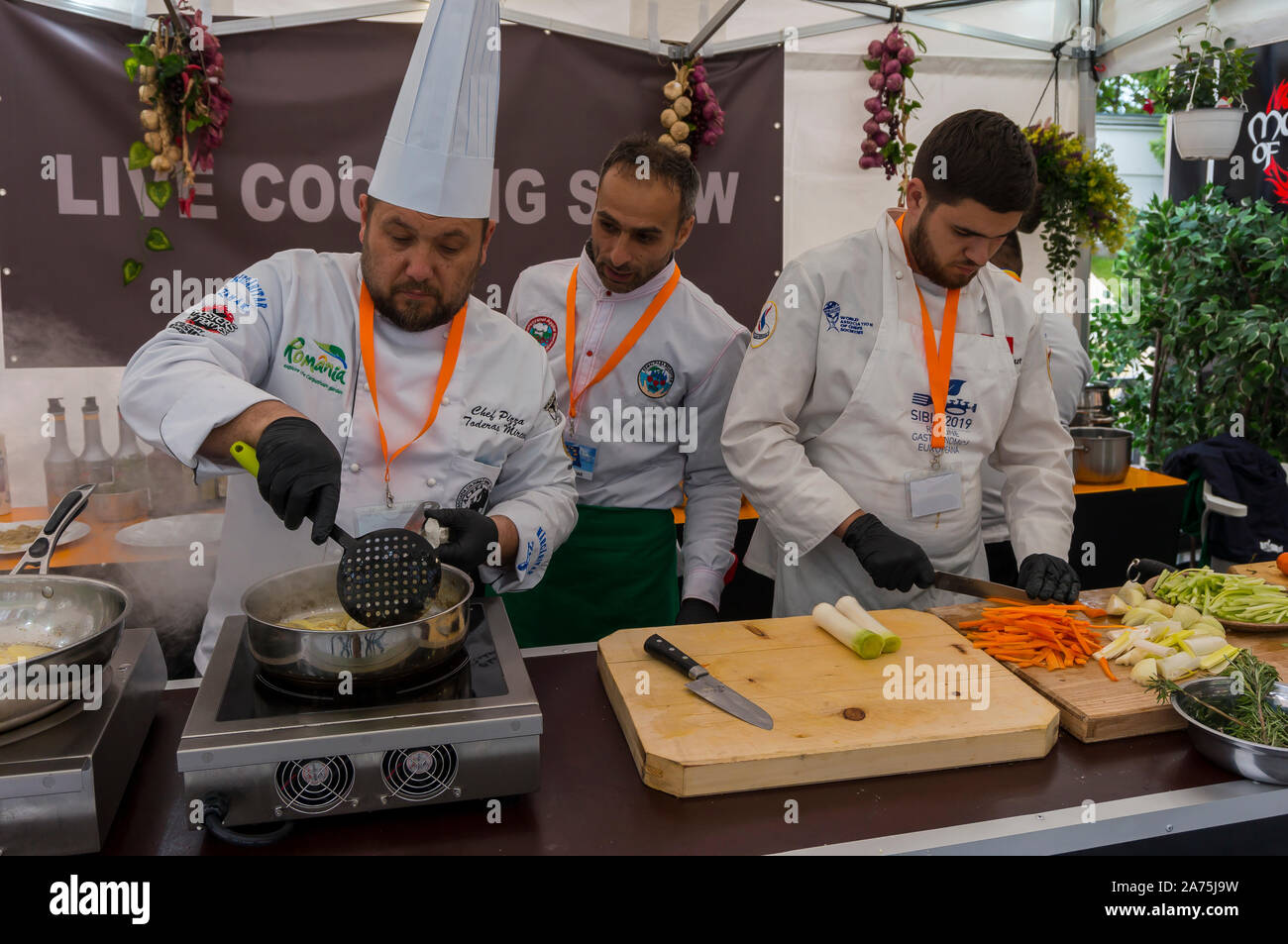 Live cooking street festival Stock Photo - Alamy