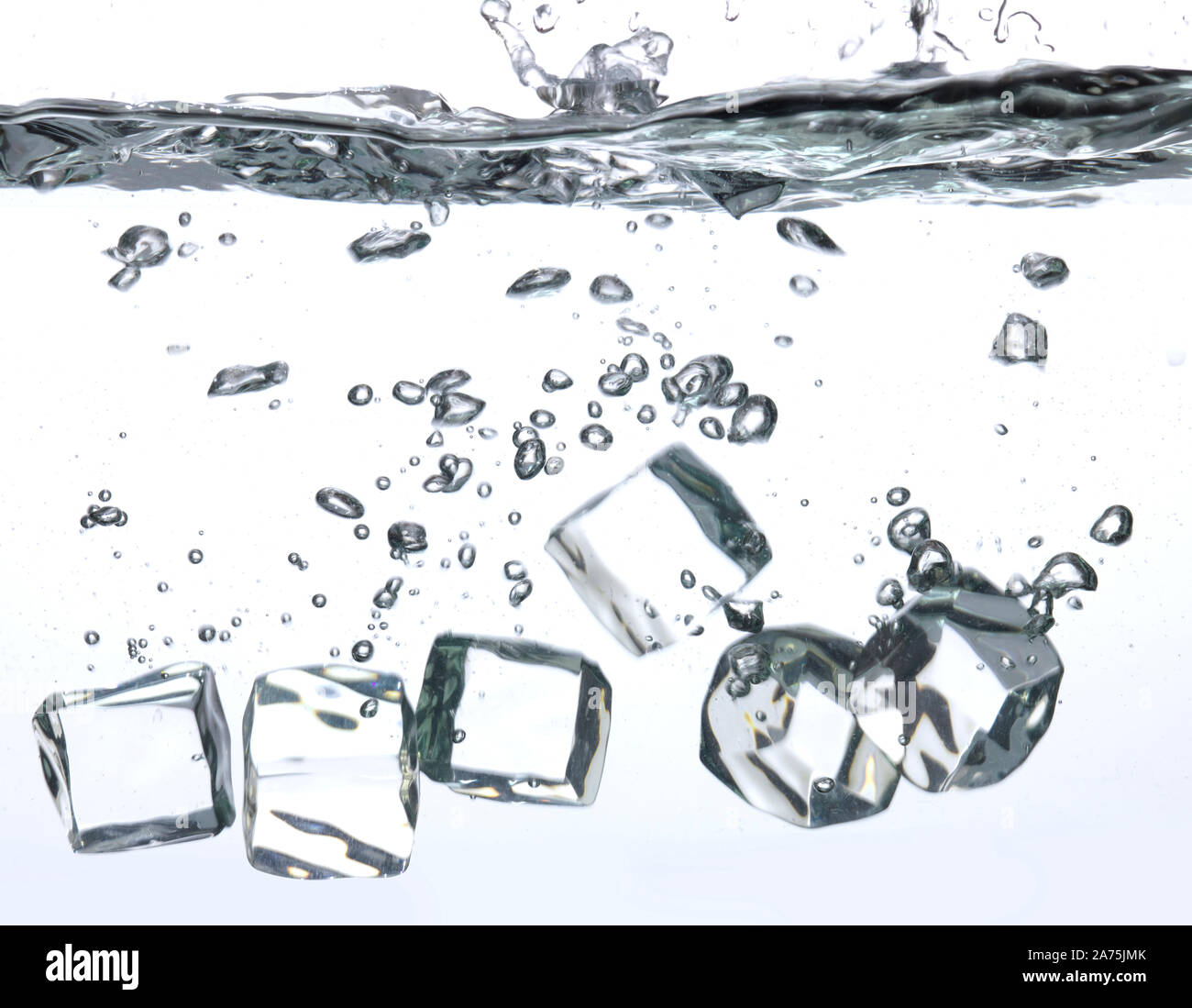 Ice cubes falling into the water Stock Photo - Alamy