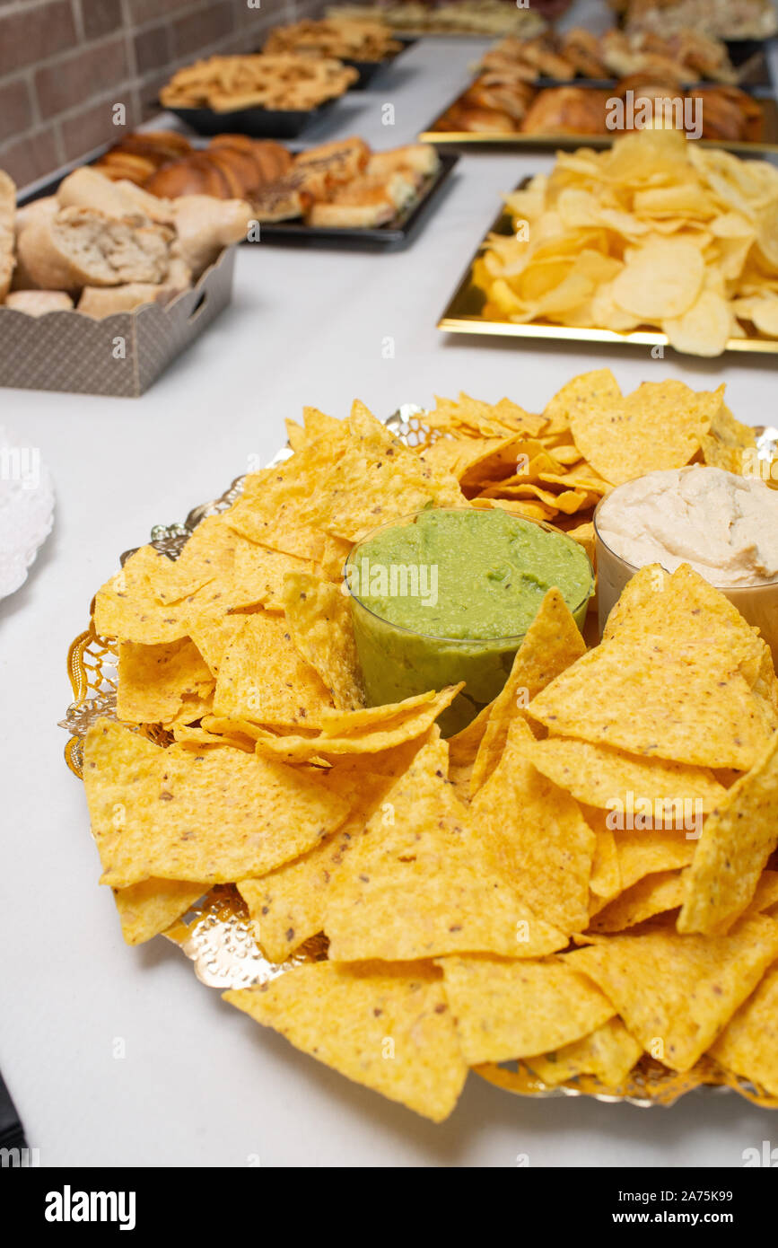 Table of appetizers with mexican nachos Stock Photo - Alamy