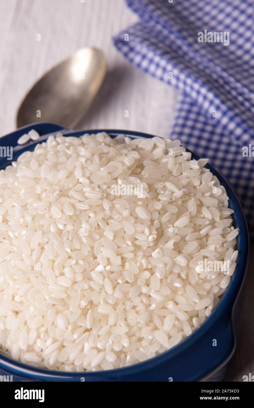 White rice in a pan before cooking Stock Photo - Alamy