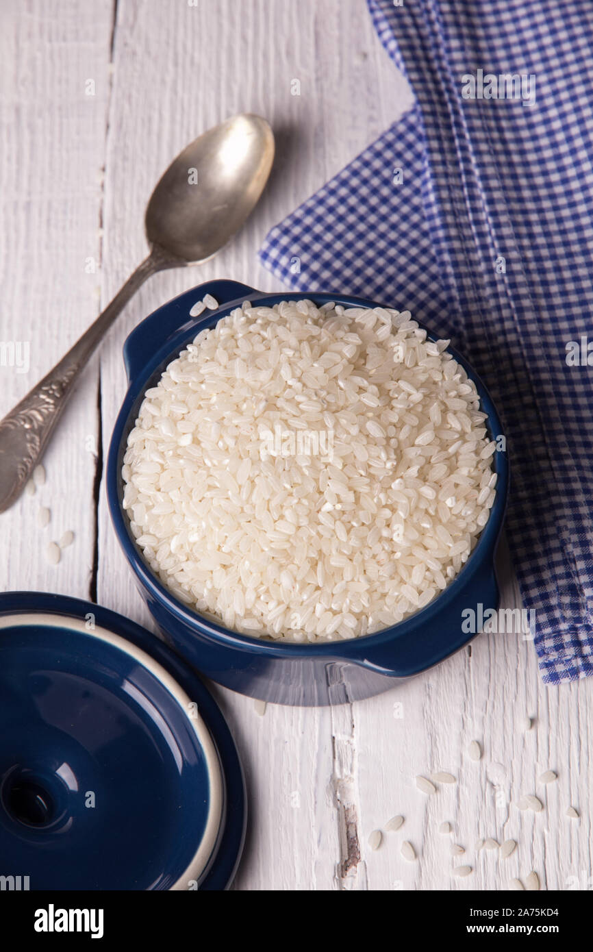 White rice in a pan before cooking Stock Photo - Alamy