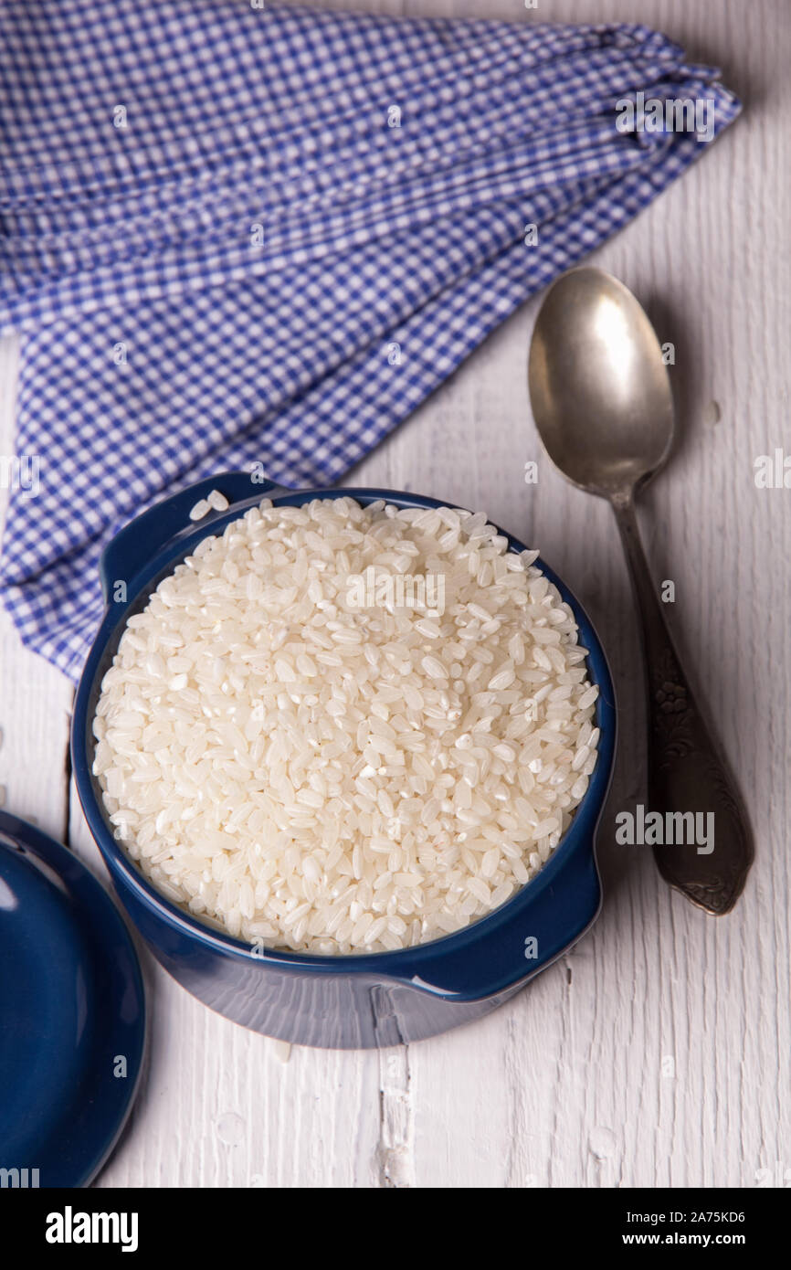 White rice in a pan before cooking Stock Photo - Alamy