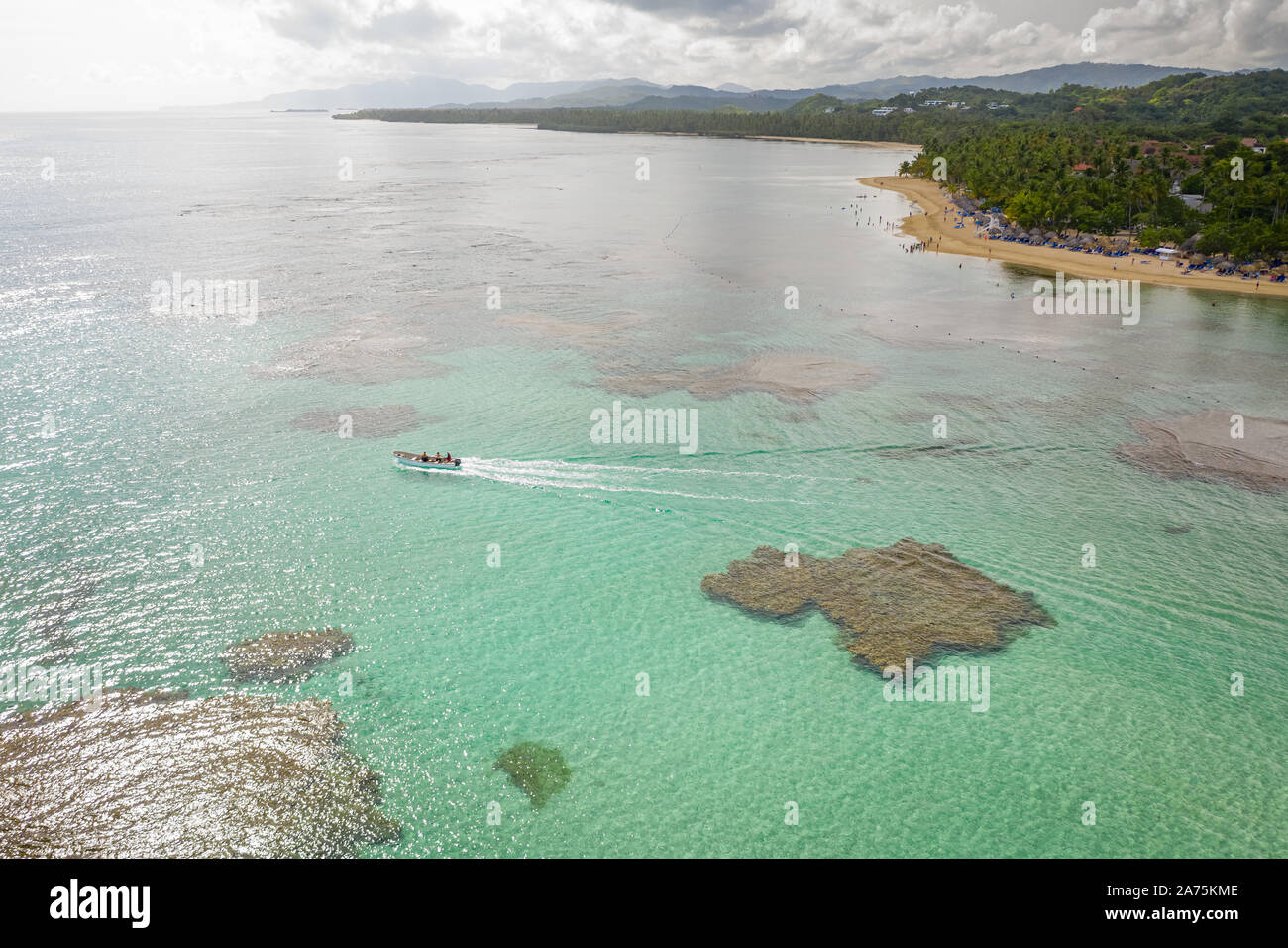 Aerial photography of tropical beach and boat while sailing .Samana ...
