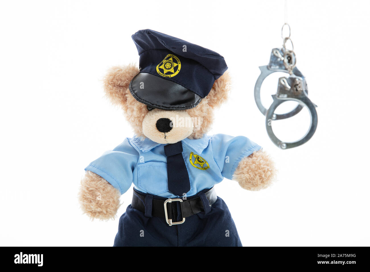 Police and arrest concept. Cute teddy bear in police officer uniform ...