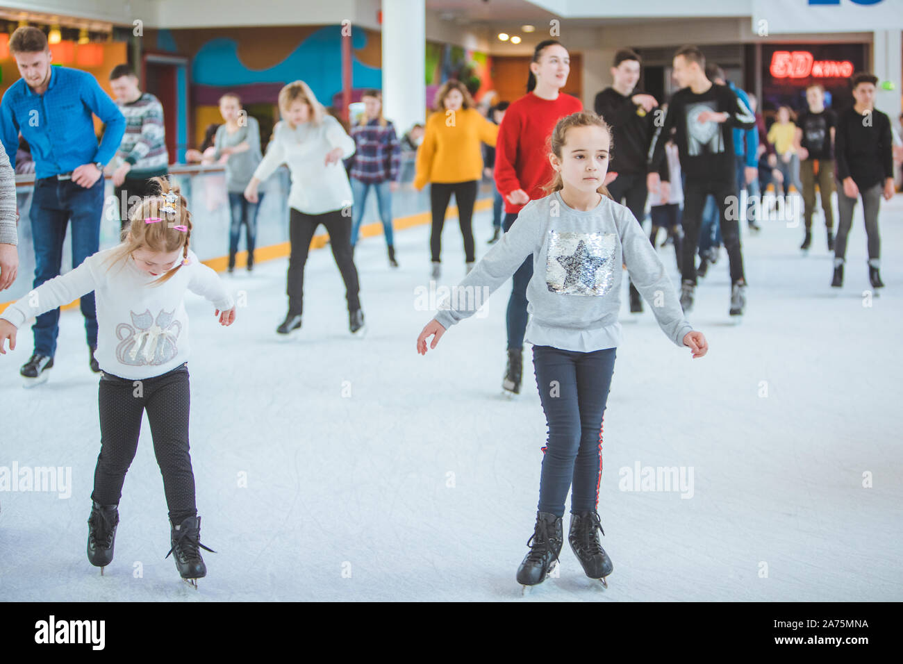 LVIV, UKRAINE - February 3, 2019: people skating on ski rink in city ...