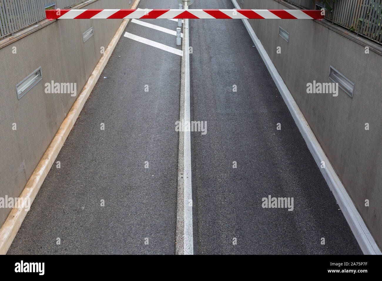 Two Way Road to Underground Parking Garage Stock Photo - Alamy