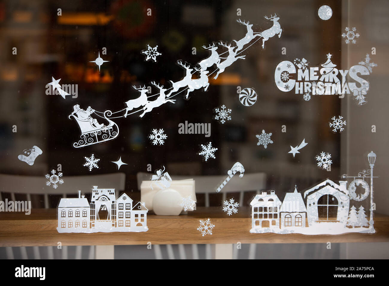 christmas holidays decoration on window glass Stock Photo - Alamy