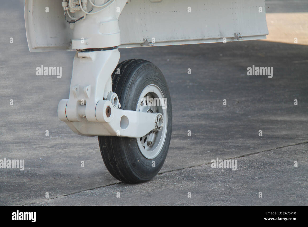 The Retractable Front Landing Wheel of an Aircraft Stock Photo - Alamy