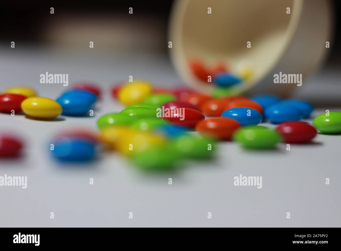 Sugar Coated Chocolate Gems Candy Stock Photo - Alamy