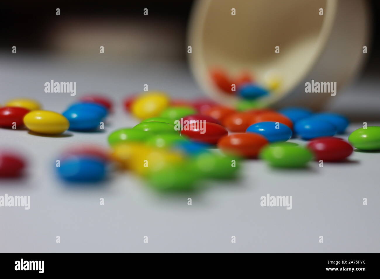 Sugar Coated Chocolate Gems Candy Stock Photo - Alamy