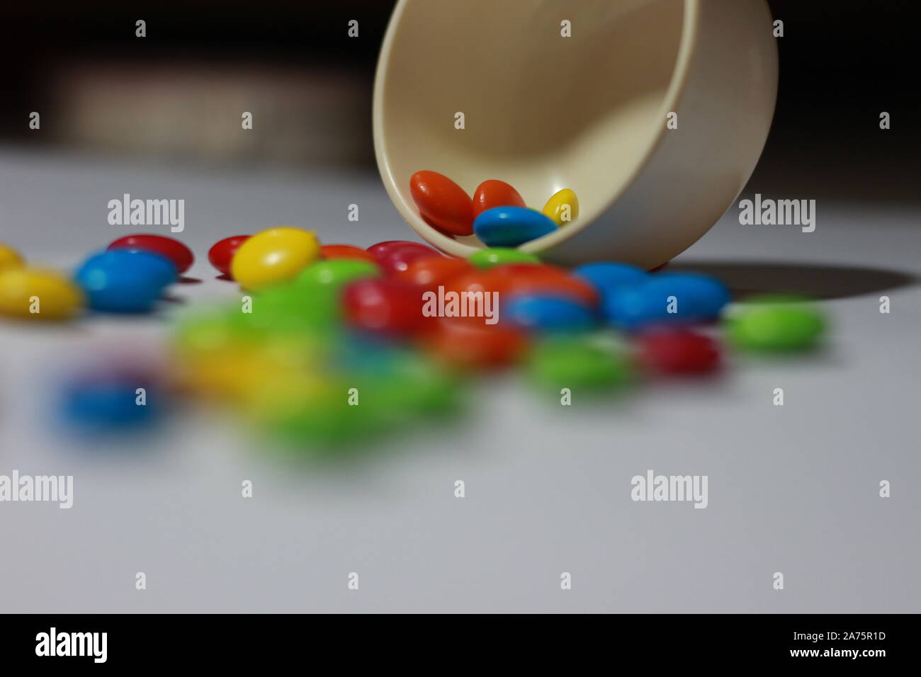 Sugar Coated Chocolate Gems Candy Stock Photo - Alamy