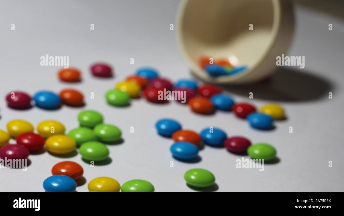 Sugar Coated Chocolate Gems Candy Stock Photo - Alamy