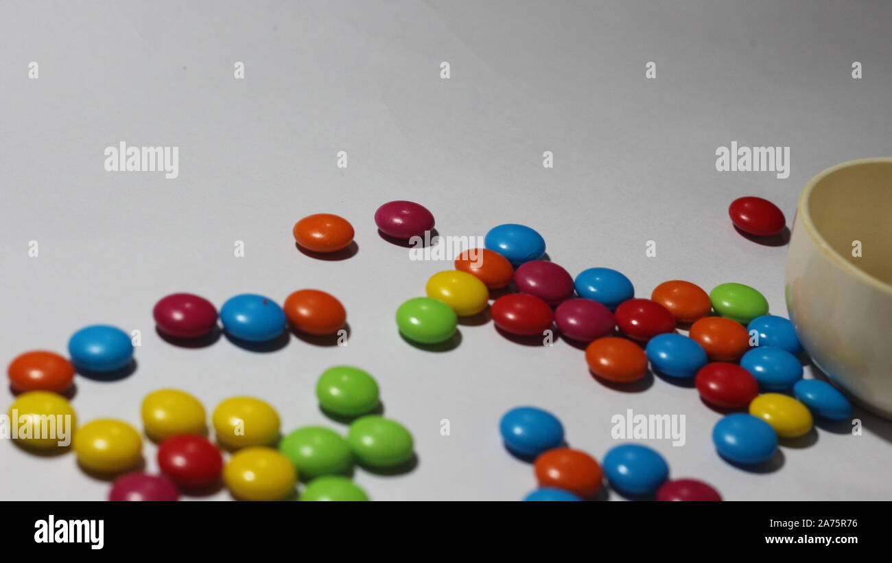 Sugar Coated Chocolate Gems Candy Stock Photo - Alamy