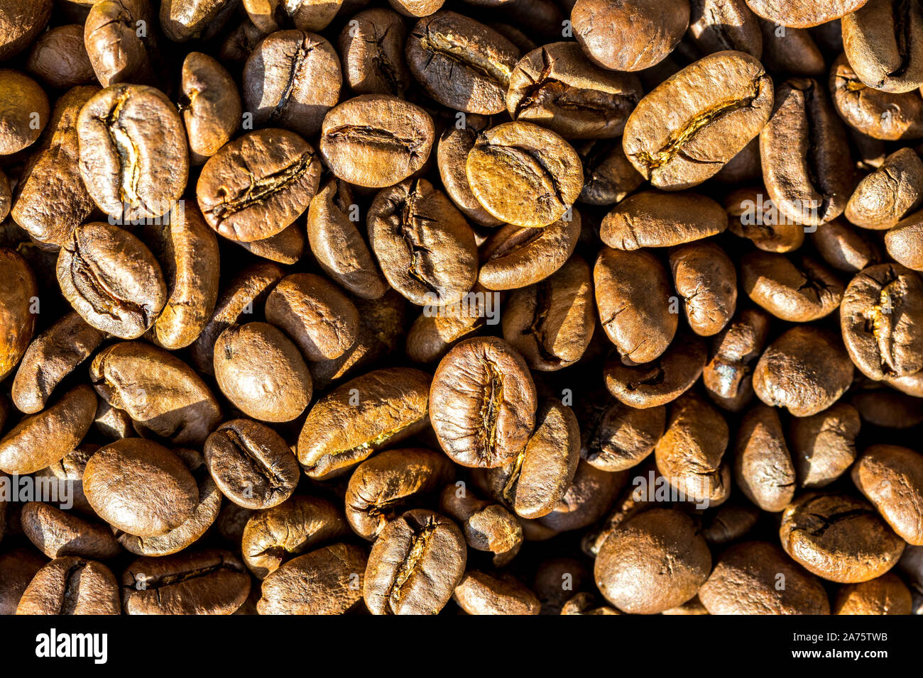 Top view on black roasted coffee beans. Texture Stock Photo - Alamy