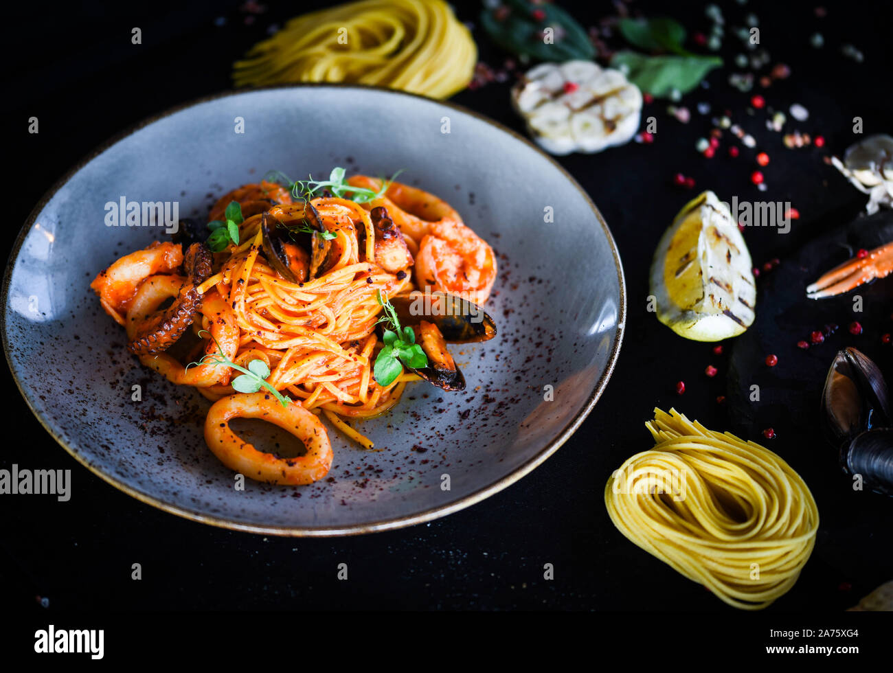 delicious italian spaghetti with fresh seafood & tasty vegetables Stock ...