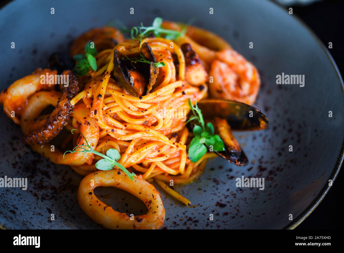 delicious italian spaghetti with fresh seafood & tasty vegetables Stock ...