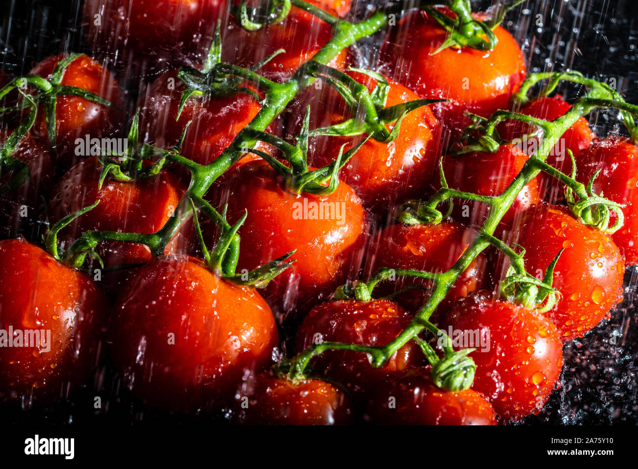 vegetable under flowing water Stock Photo - Alamy