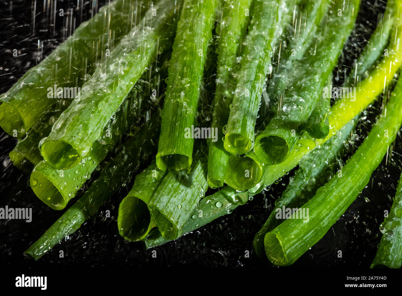 vegetable under flowing water Stock Photo - Alamy