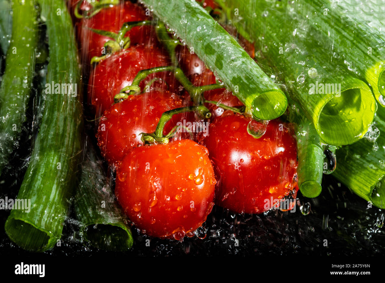 vegetable under flowing water Stock Photo - Alamy