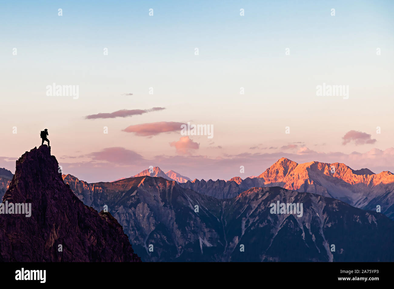 Hiker sunset alpine panorama hi-res stock photography and images - Alamy