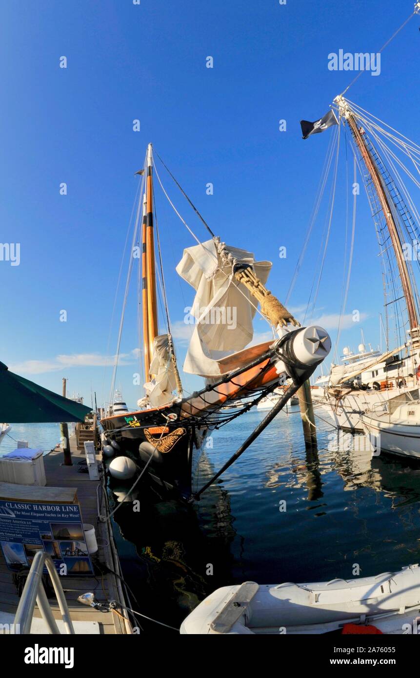 Classic Schooner America 2.0, with tall masts, lines, lowered sails ...