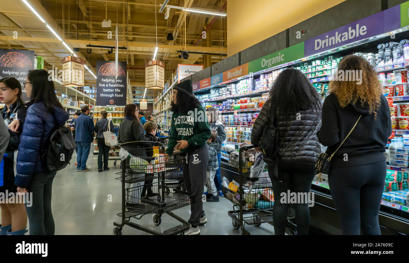 Thousands of excited shoppers flock to the Wegmans supermarket in ...