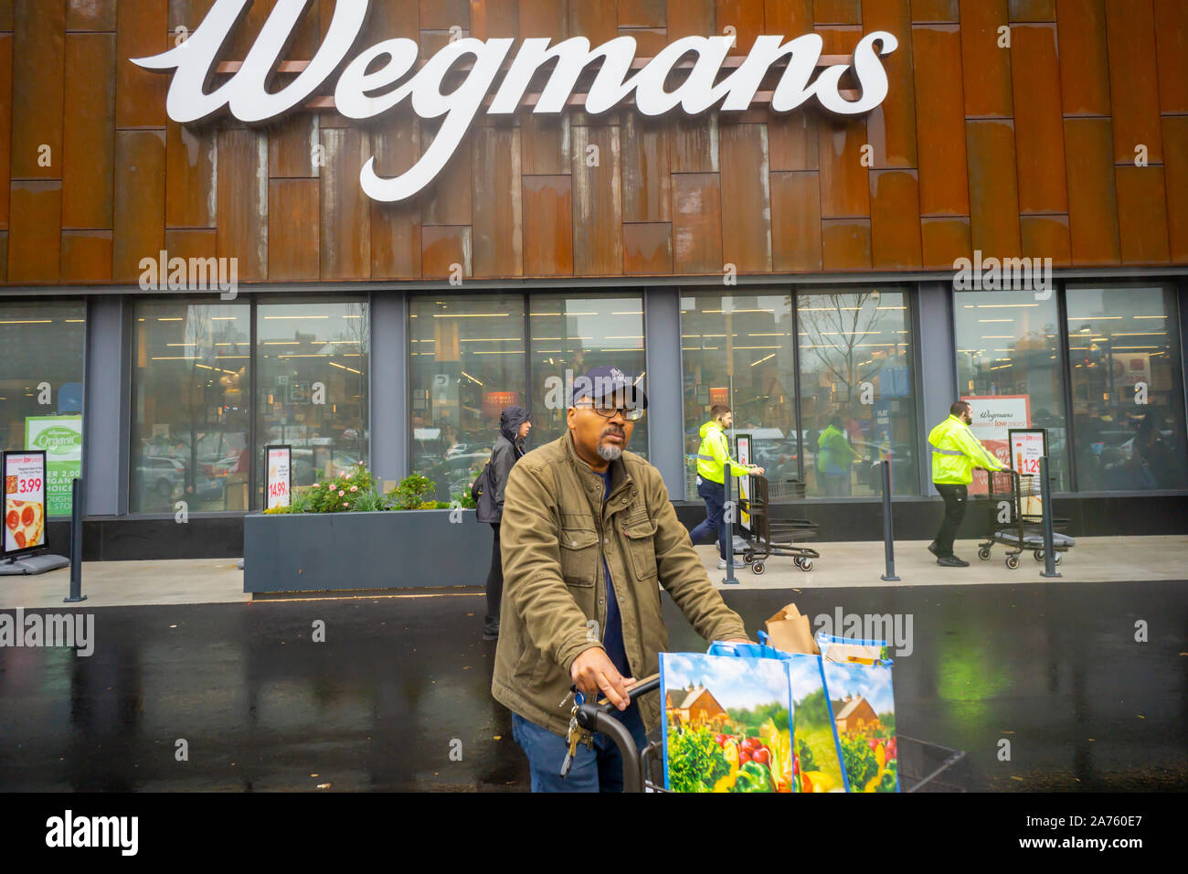 Thousands of excited shoppers flock to the Wegmans supermarket in ...