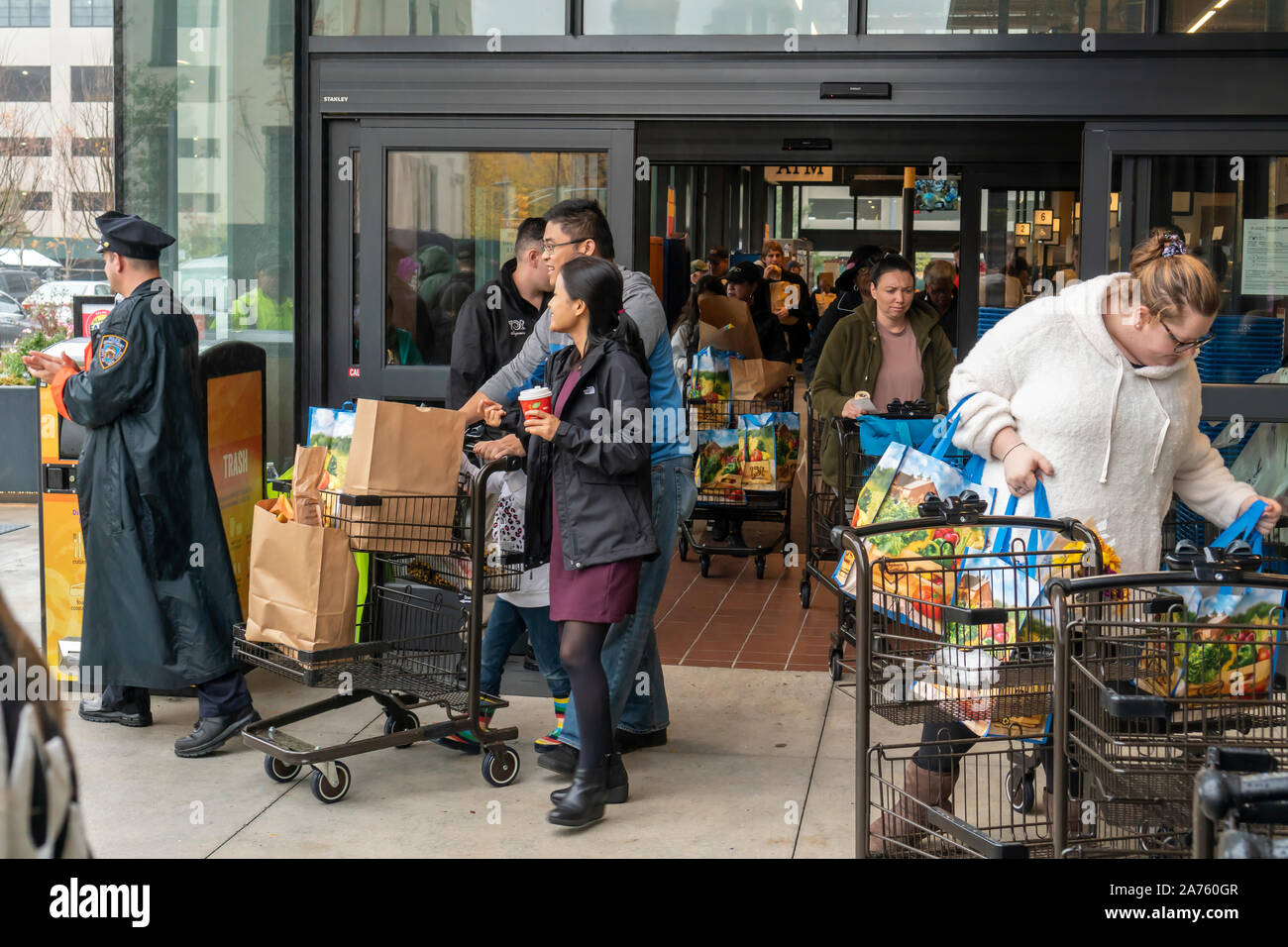 Thousands of excited shoppers flock to the Wegmans supermarket in ...