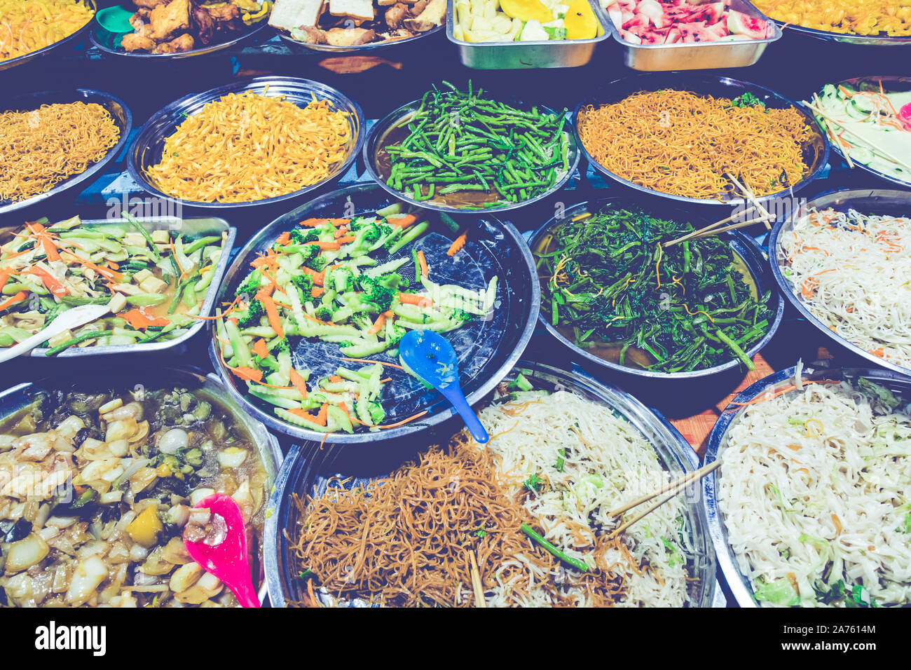 Food bazaar. Traditional buffet at local street food at Night Market at ...