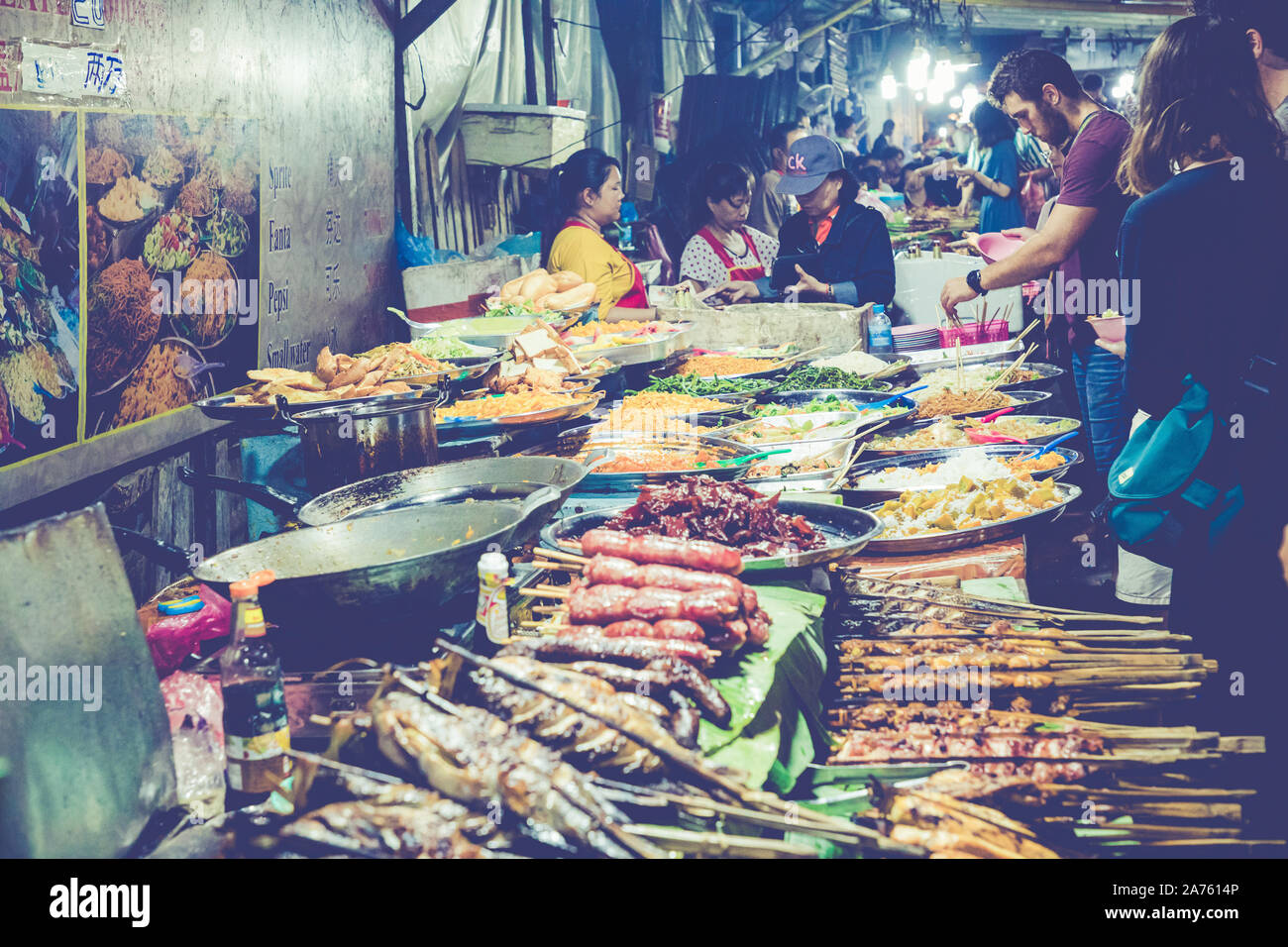 LUANG PRABANG, LAOS - OCTOBER 10, 2019: Food bazaar. Traditional buffet ...