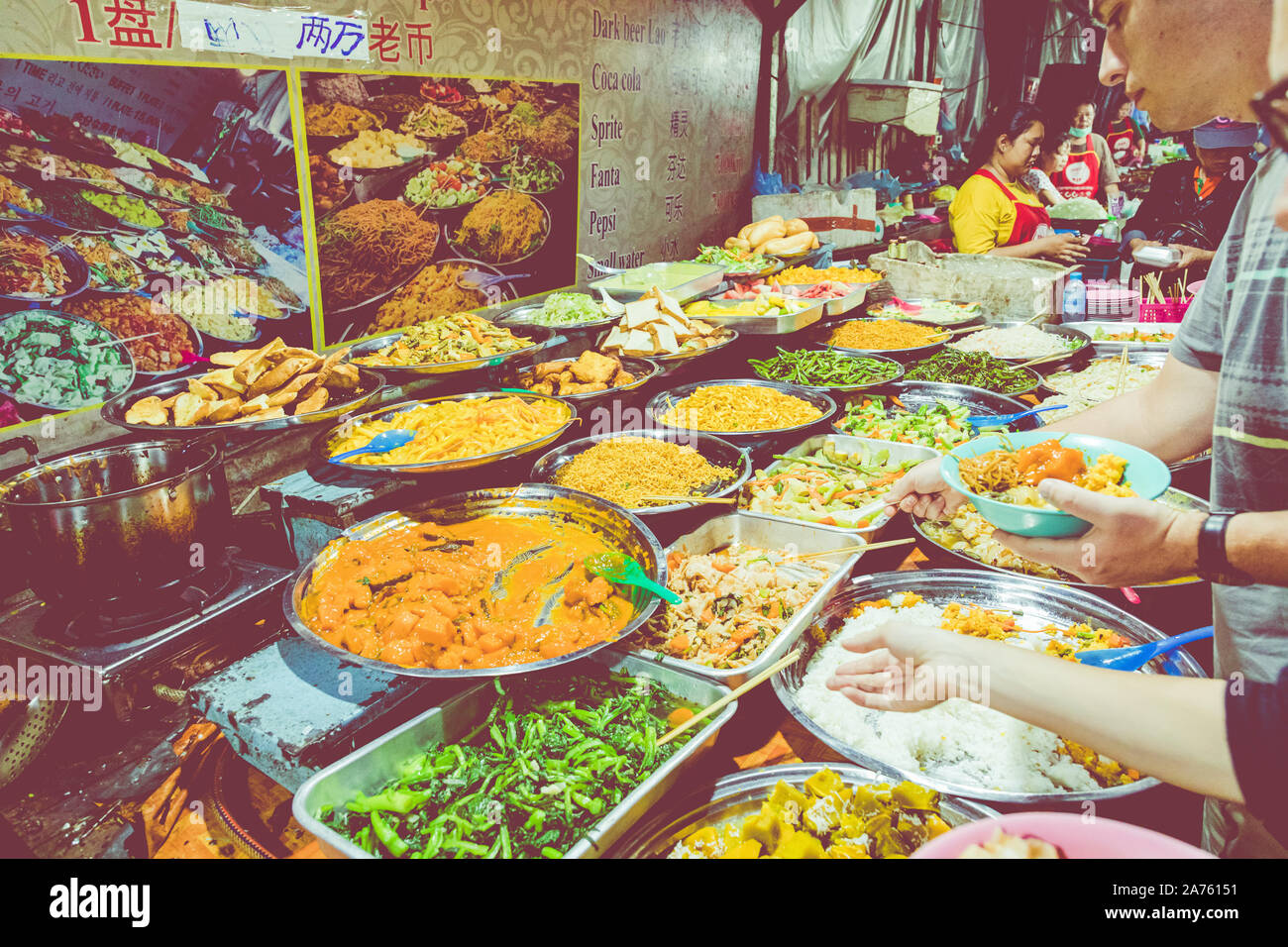 Food bazaar. Traditional buffet at local street food at Night Market at ...